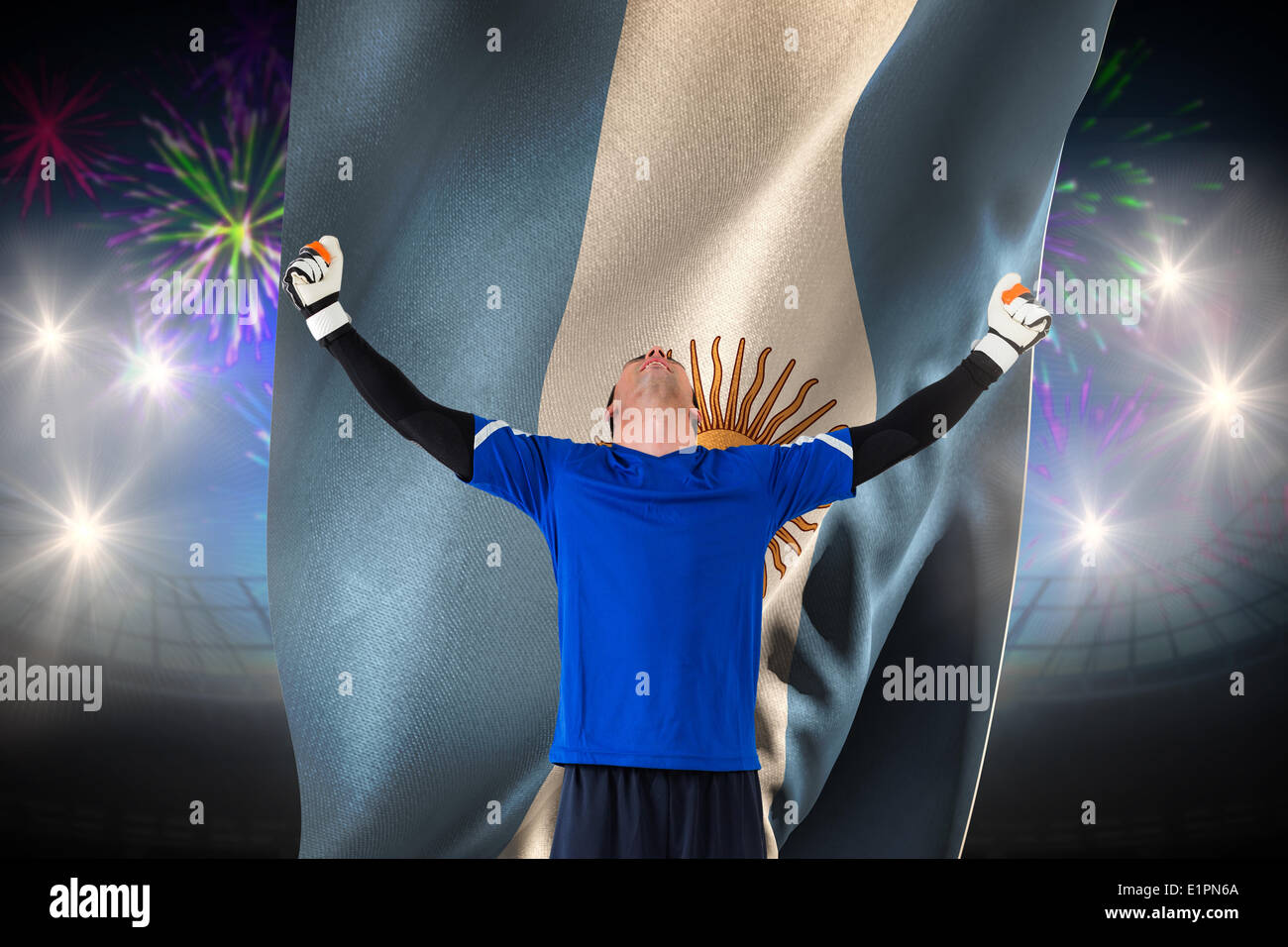 Composite image of goalkeeper celebrating a win Stock Photo - Alamy