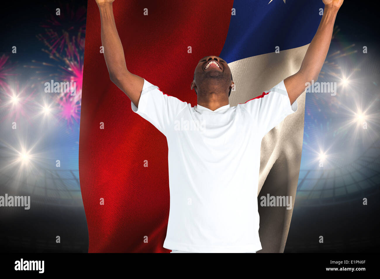 Composite image of excited handsome football fan cheering Stock Photo ...