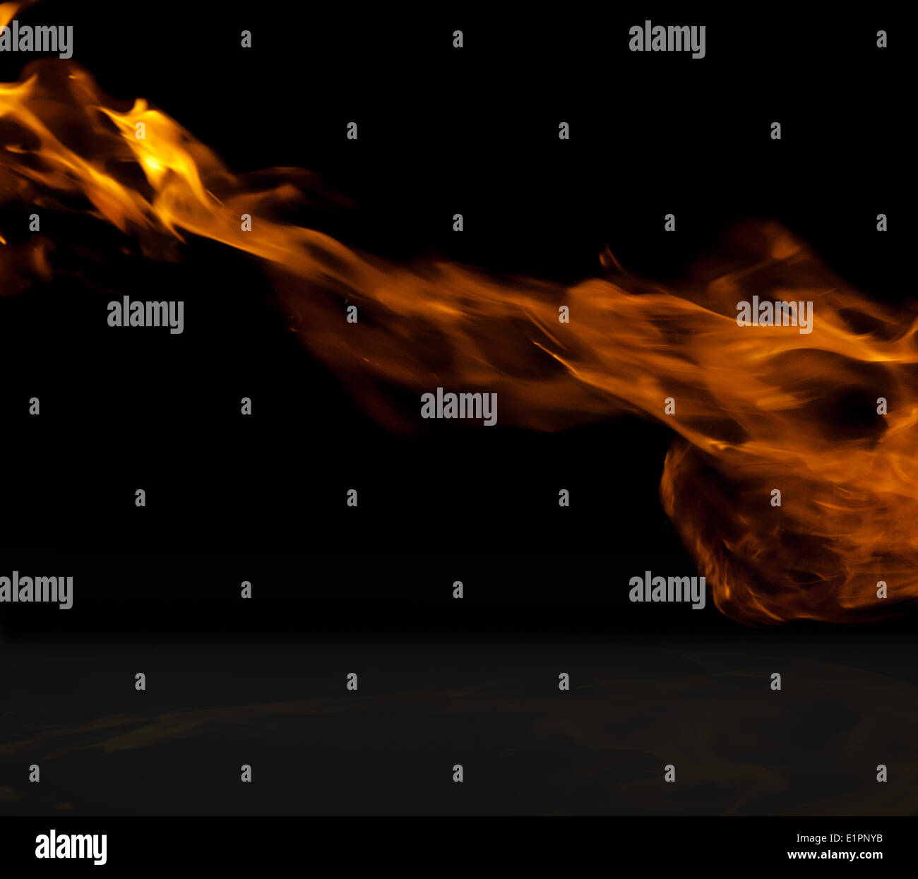 Orange fire design on black Stock Photo - Alamy
