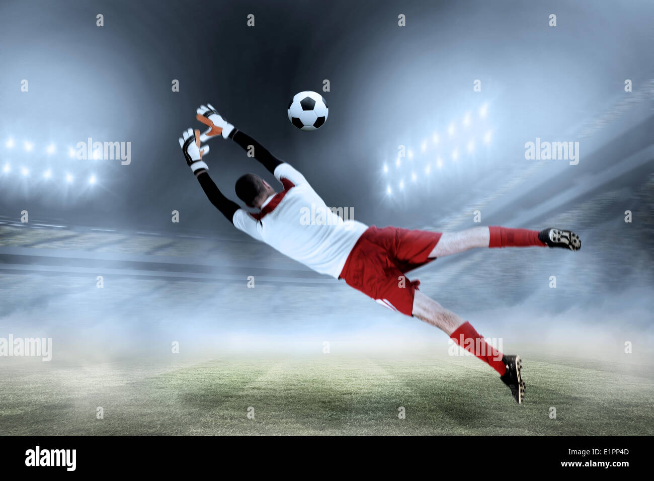Goalie jumping hi-res stock photography and images - Alamy