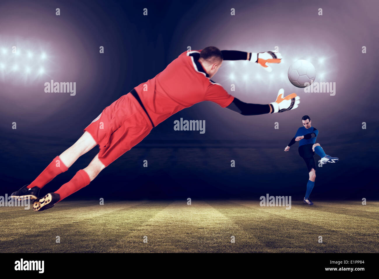 Composite image of fit goal keeper saving goal through tv against ...