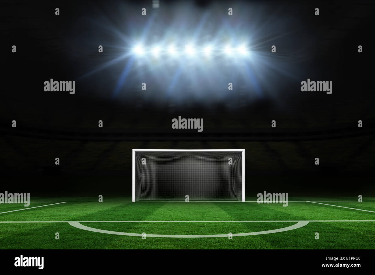 Football pitch under spotlights Stock Photo - Alamy