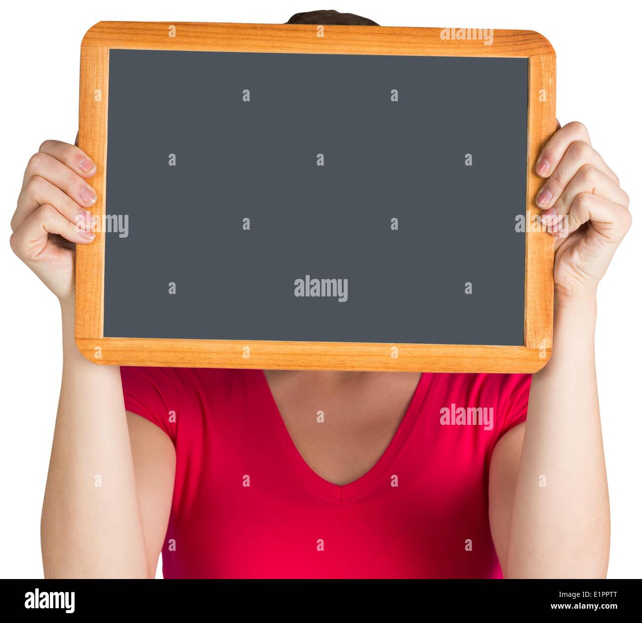 Woman holding chalkboard over face Stock Photo - Alamy