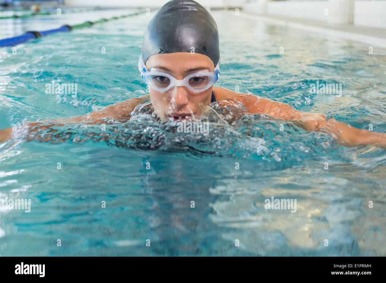 Fit swimmer coming up for air in the swimming pool Stock Photo - Alamy