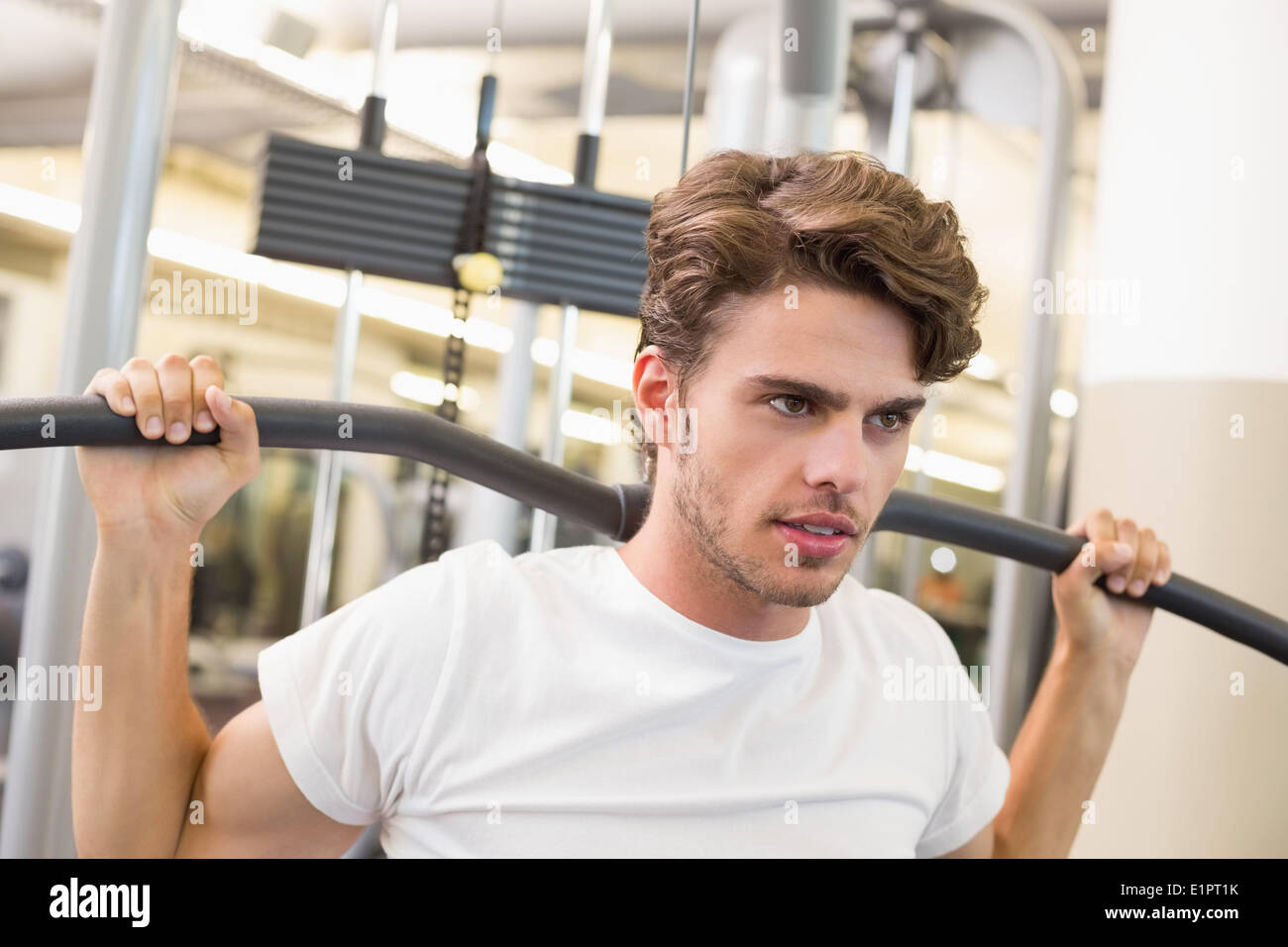 Muscular fit man using hi-res stock photography and images - Alamy