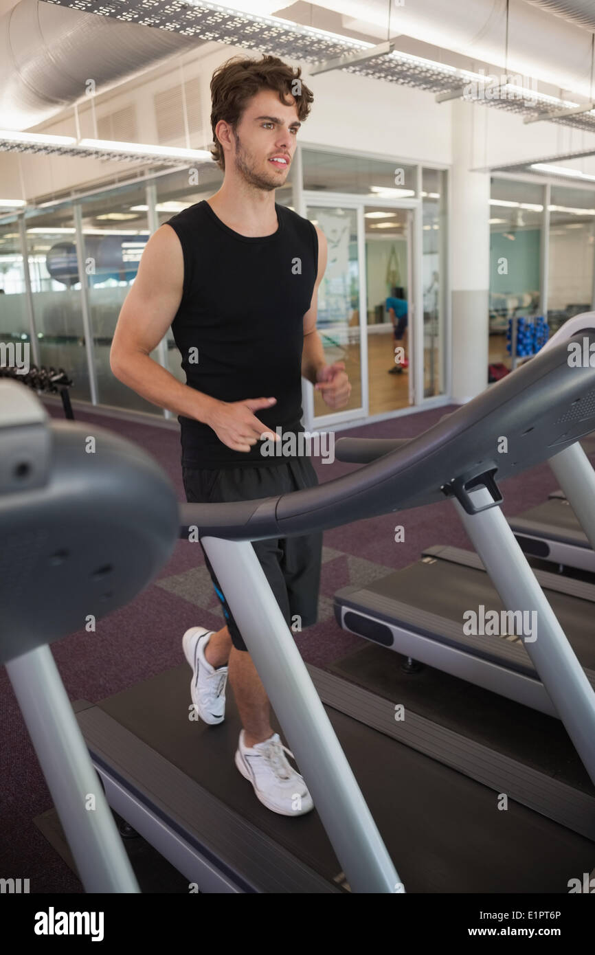 Young fit man jogging on hi-res stock photography and images - Alamy