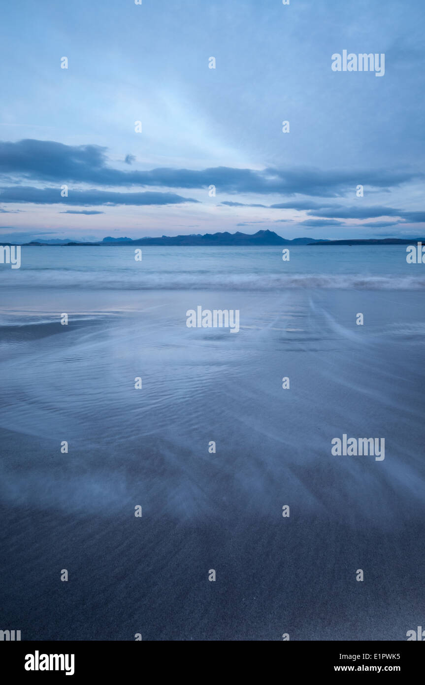 Sea at dusk, Mellon Udrigle beach, with the mountains of Assynt and ...