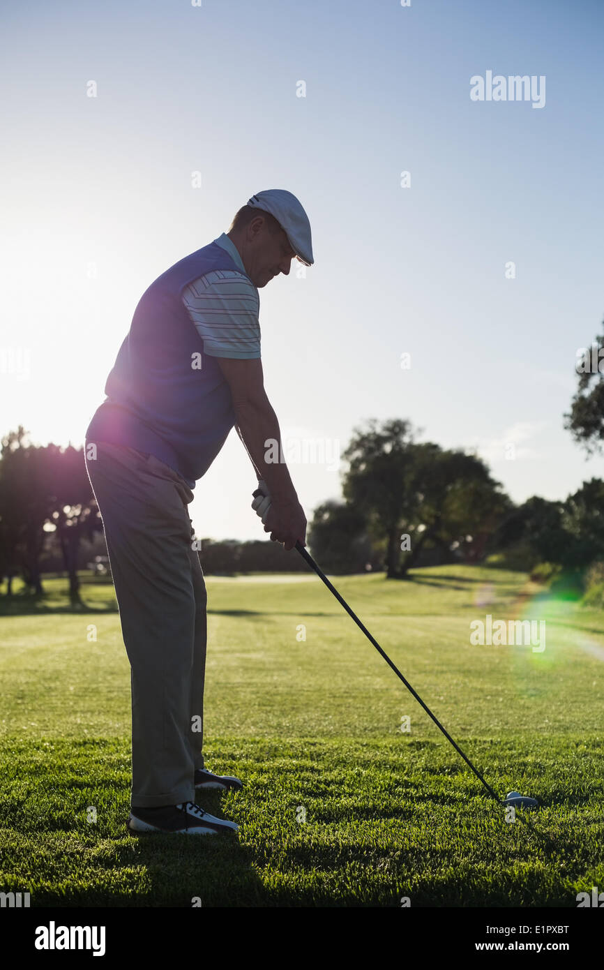 Golfer teeing off hi-res stock photography and images - Alamy