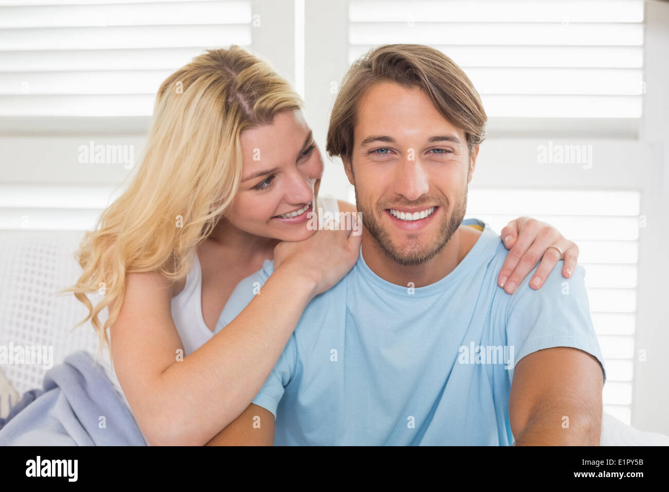Young relaxed couple sitting hi-res stock photography and images - Alamy