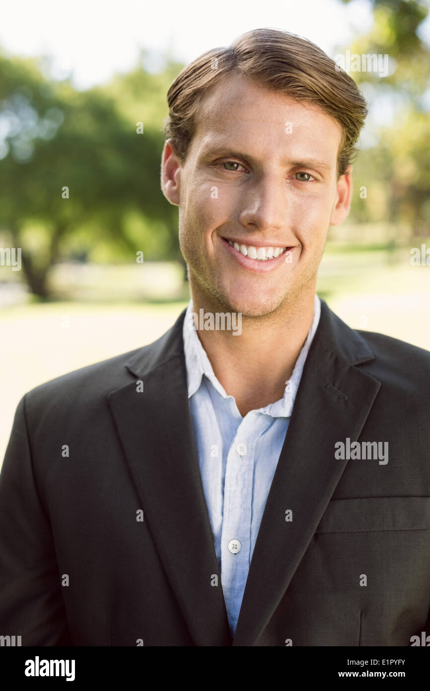 Handsome businessman smiling camera caucasian hi-res stock photography ...