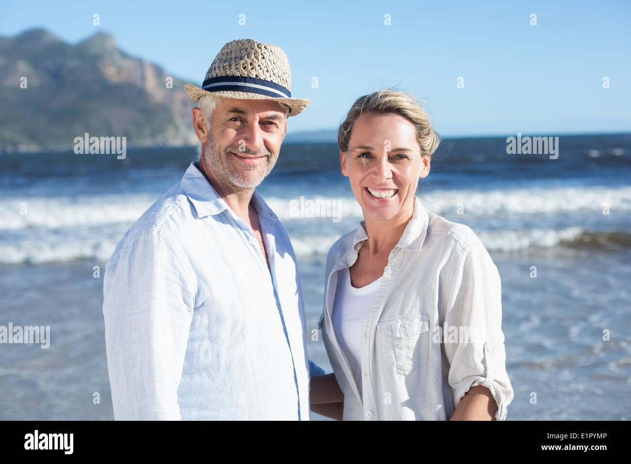 Couple standing together beach hi-res stock photography and images - Alamy
