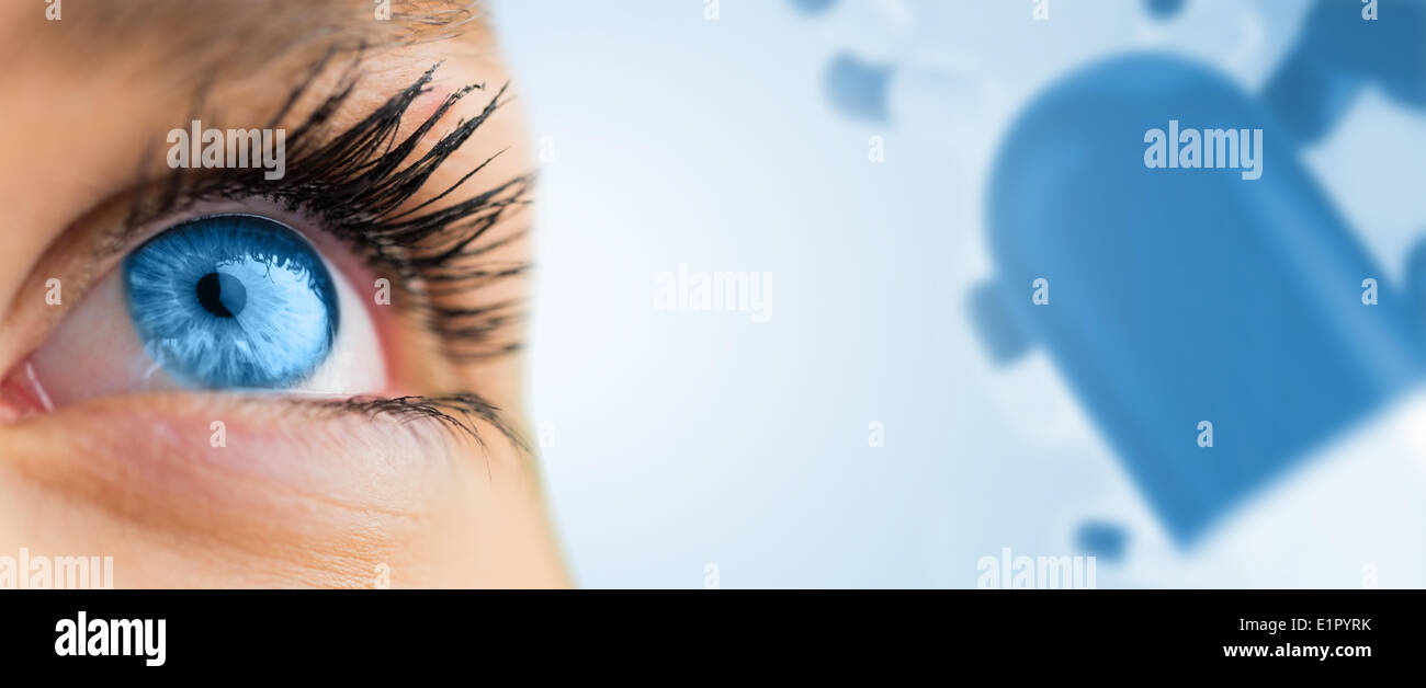Composite image of blue eye looking up on female face Stock Photo - Alamy