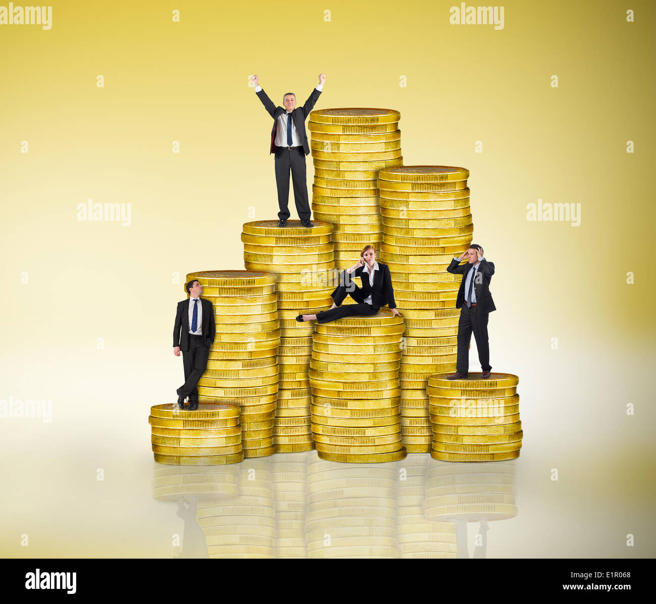 Composite image of business people on pile of coins Stock Photo - Alamy