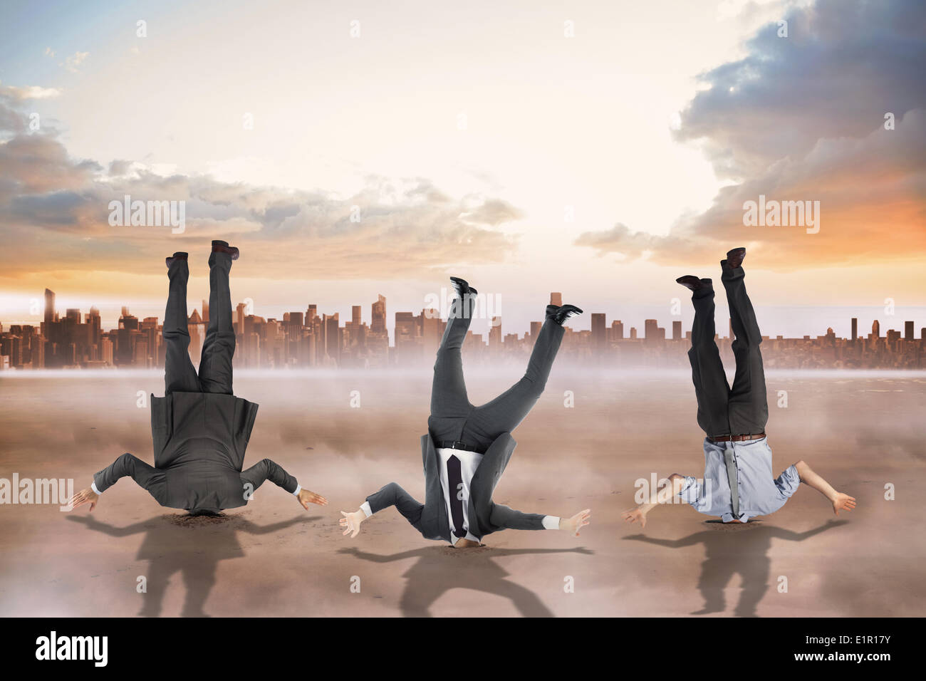 Composite image of businessmen burying their heads Stock Photo - Alamy