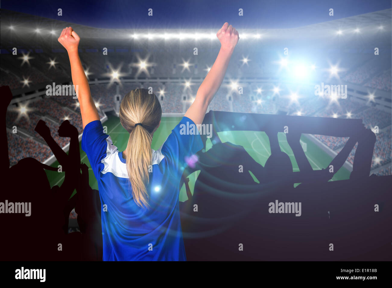 Composite image of cheering football fan in blue Stock Photo - Alamy