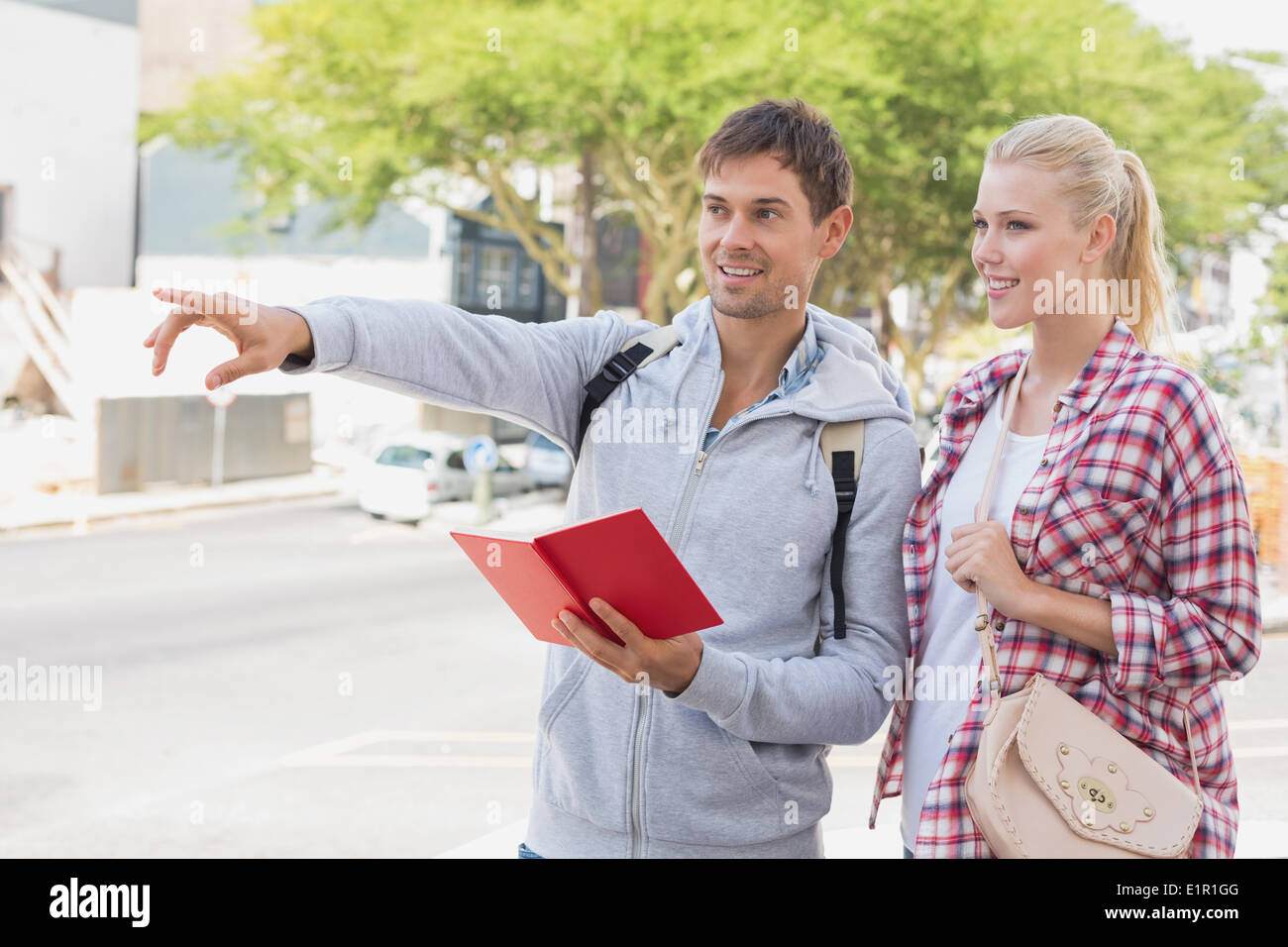 Female tourist guide hi-res stock photography and images - Alamy