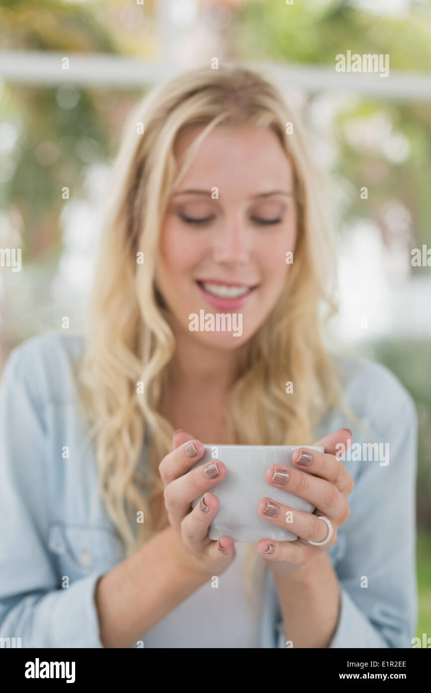 Beautiful woman sitting patio table hi-res stock photography and images ...