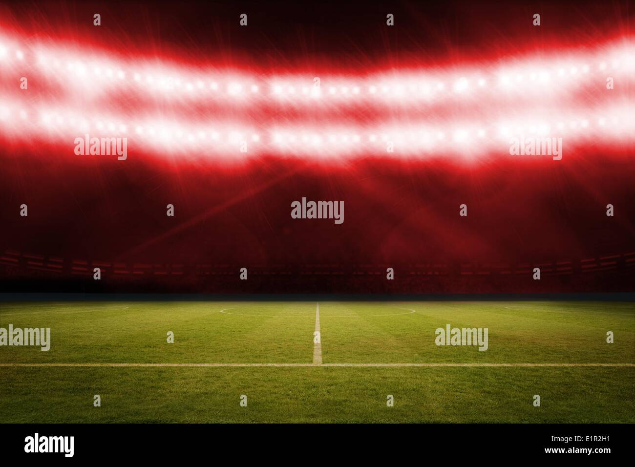 Football pitch under red lights Stock Photo - Alamy