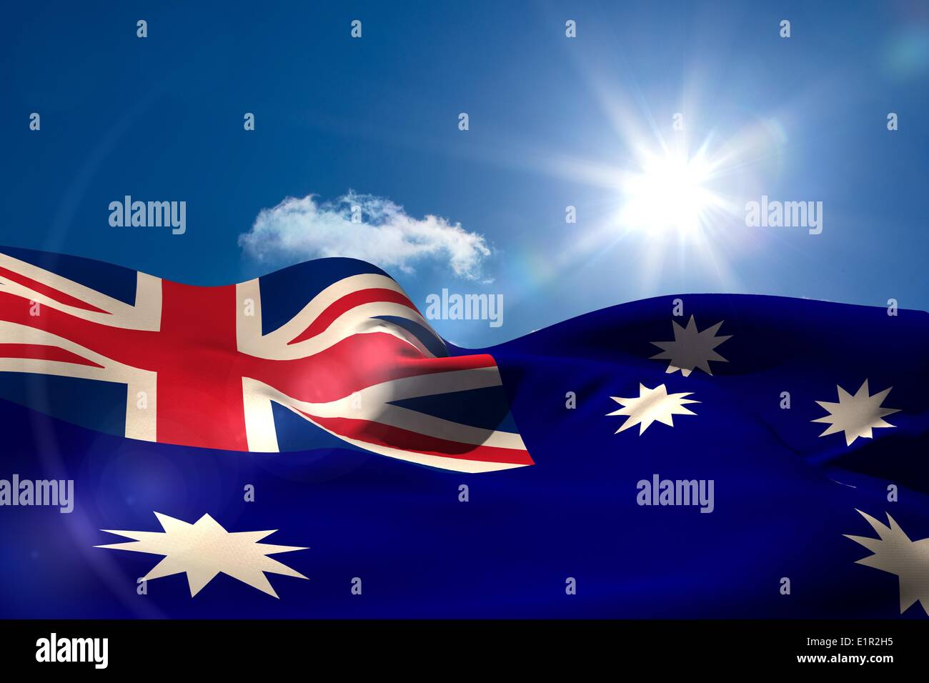 Australian national flag under sunny sky Stock Photo - Alamy