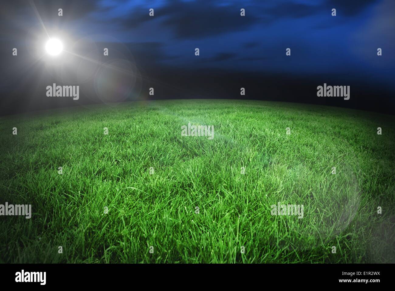 Football pitch under night sky Stock Photo - Alamy