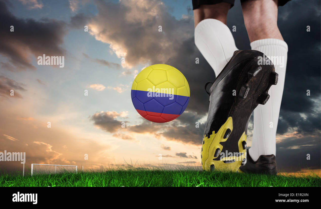 Composite image of football boot kicking colombia ball Stock Photo - Alamy