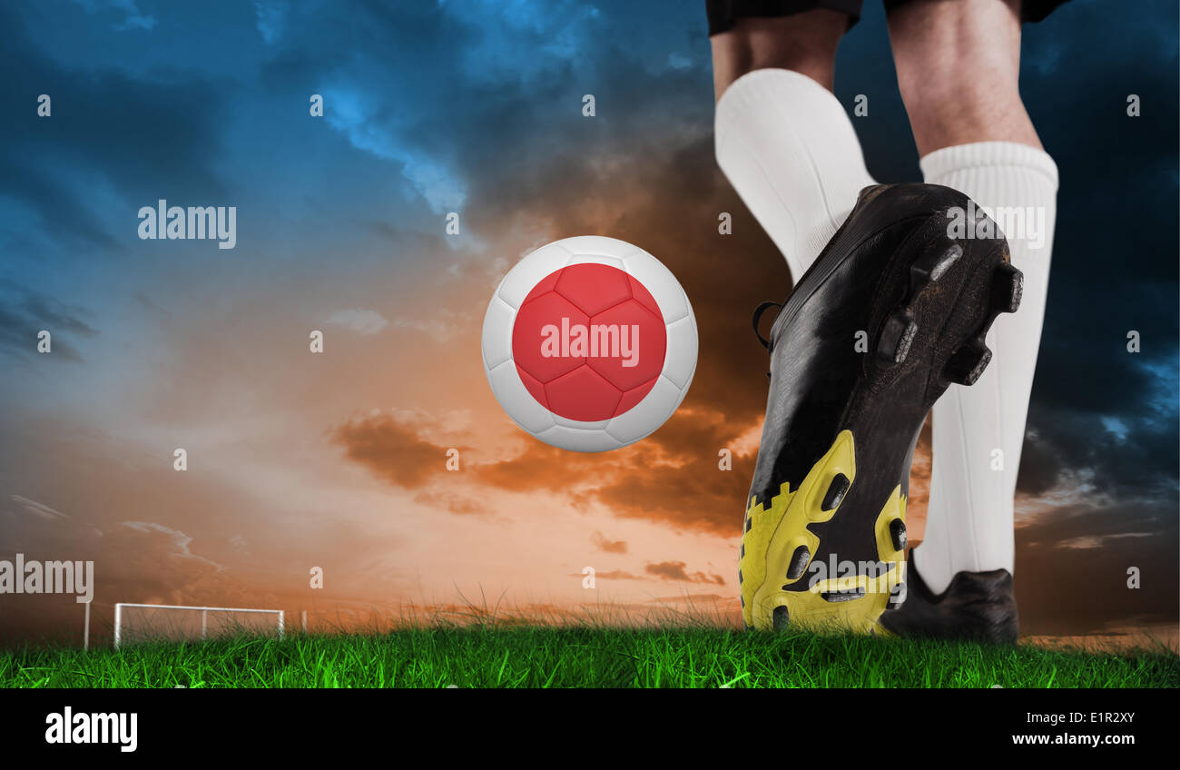 Composite image of football boot kicking japan ball Stock Photo - Alamy