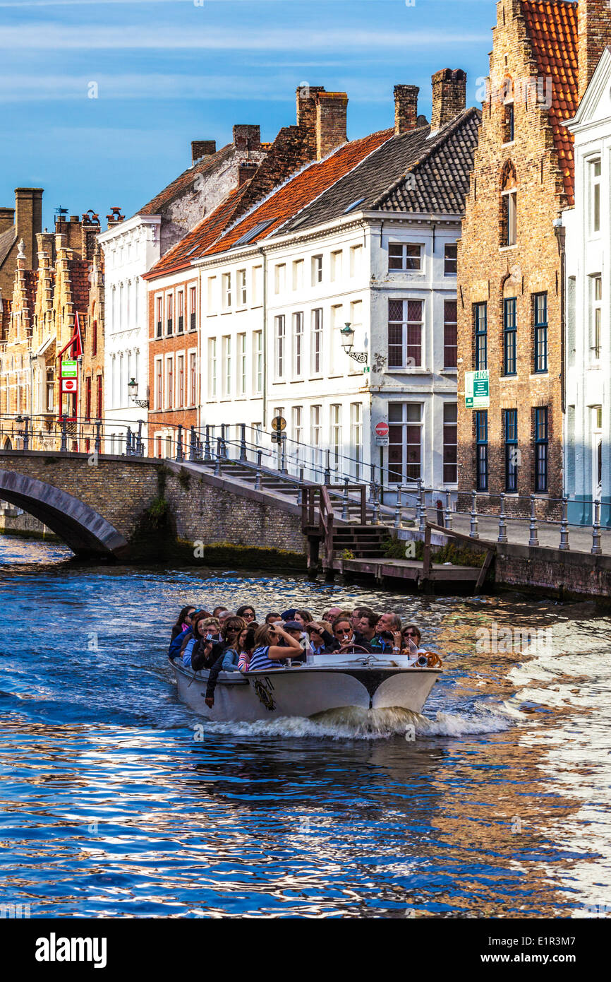 Tourist boat along the St. Annarei Canal in Bruges,(Brugge), Belgium ...