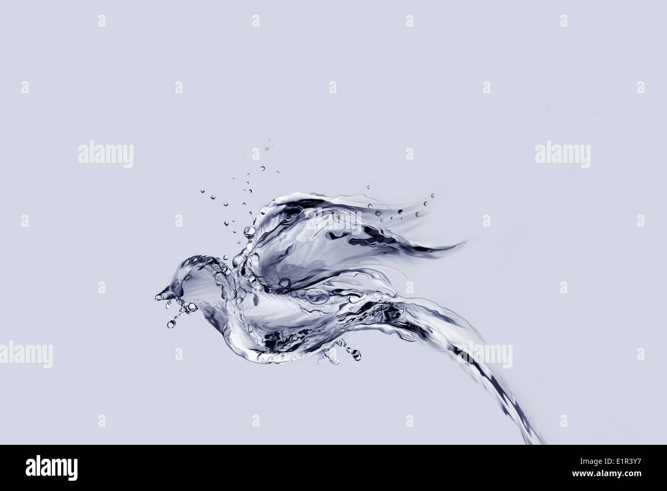 A bird made of water flying away Stock Photo - Alamy