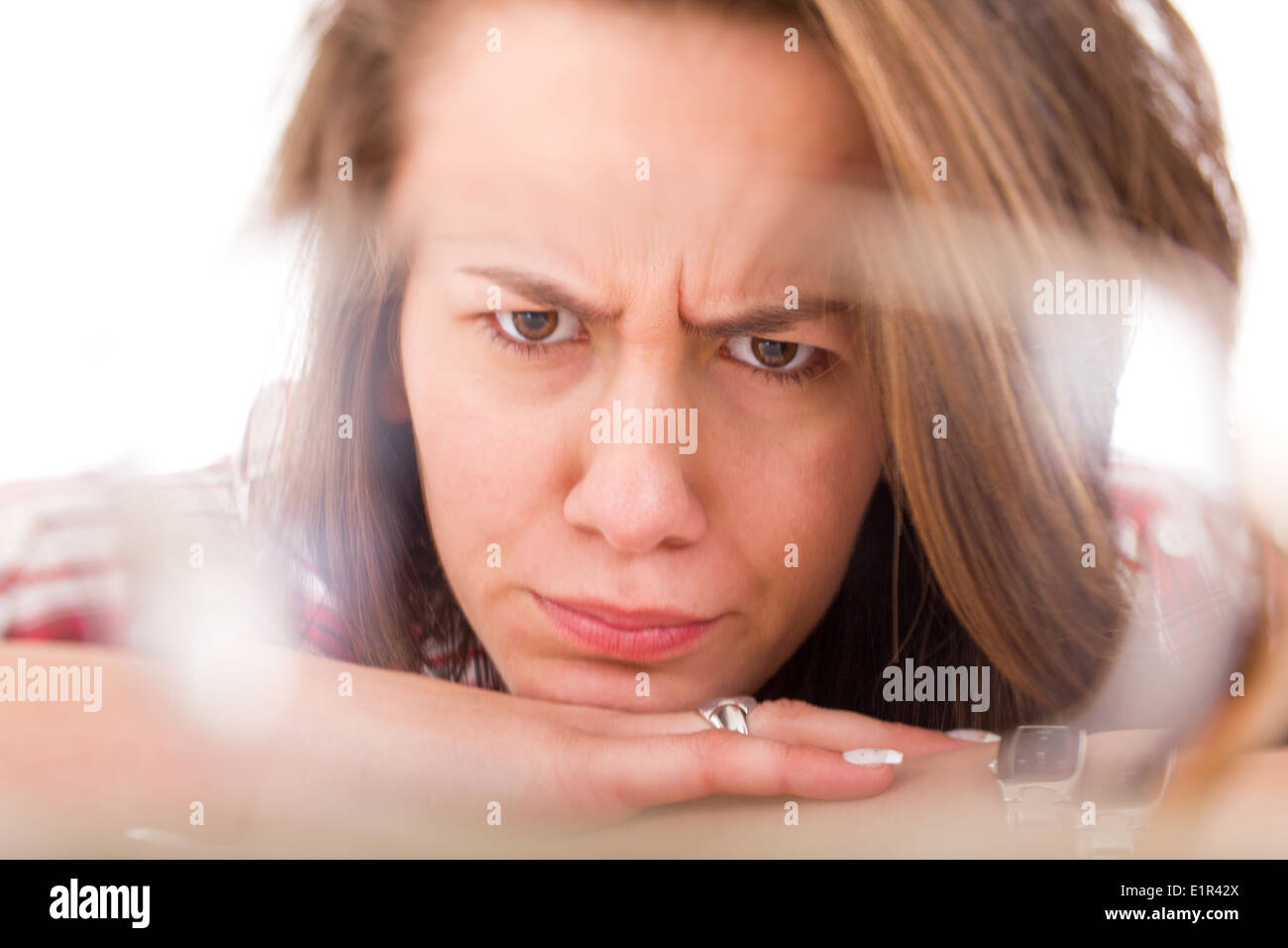 upset, anger and dissatisfied student looking through a glass lens of ...
