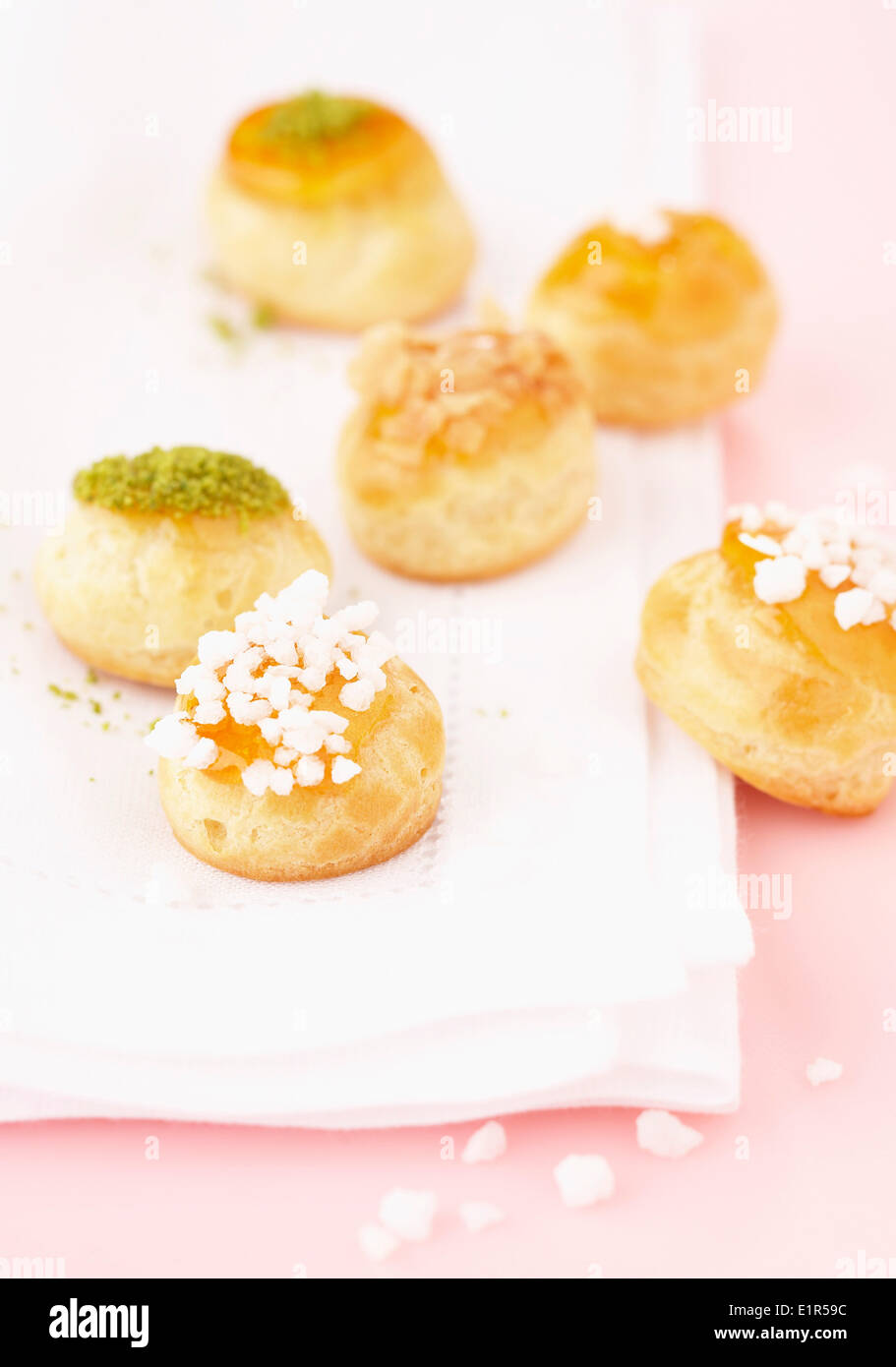 Three different flavored choux buns Stock Photo - Alamy