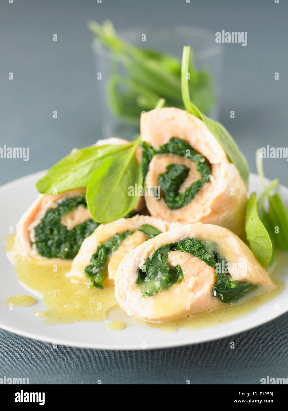 Rolled salmon fillets with spinach Stock Photo - Alamy