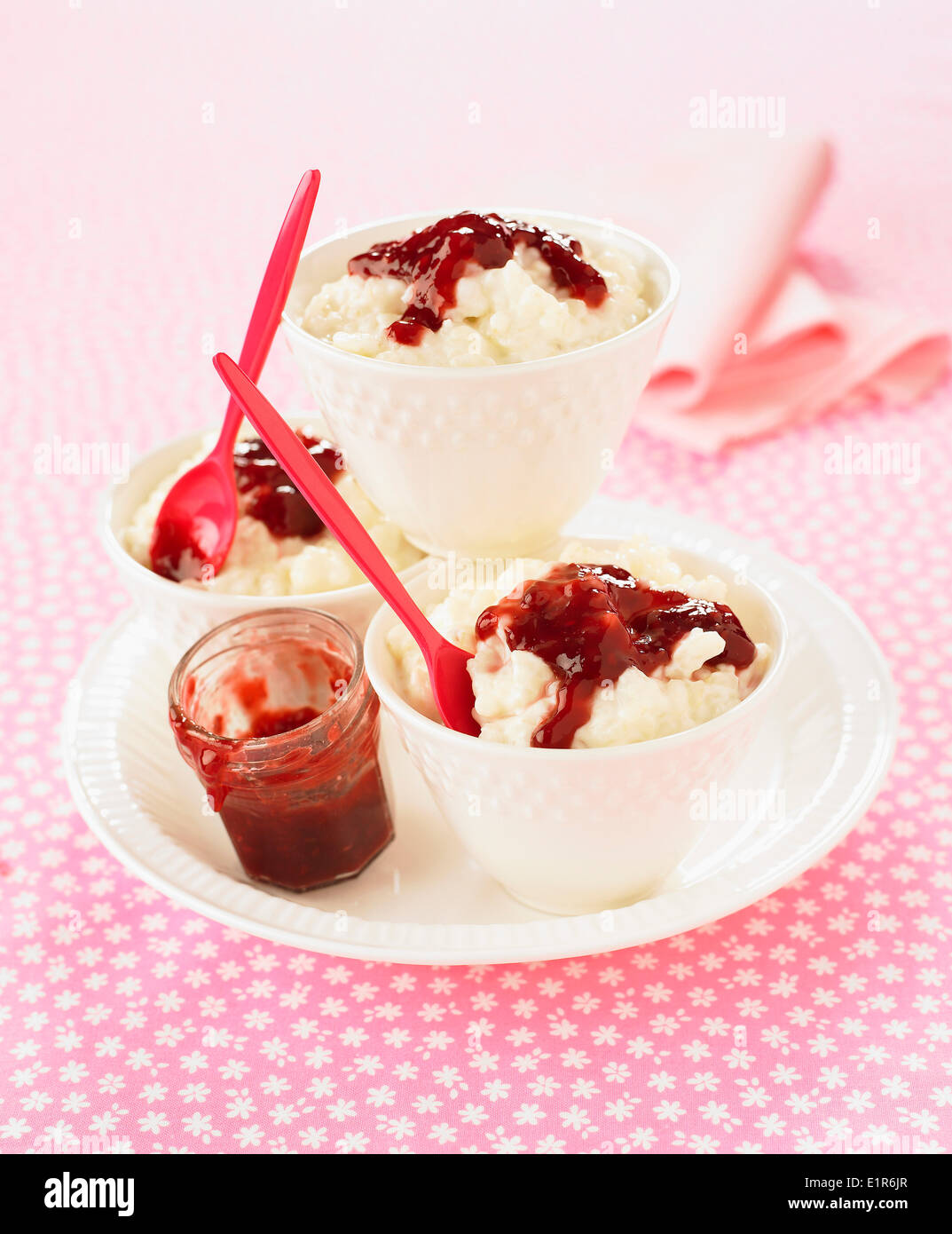 Rice pudding with summer fruit jam Stock Photo - Alamy