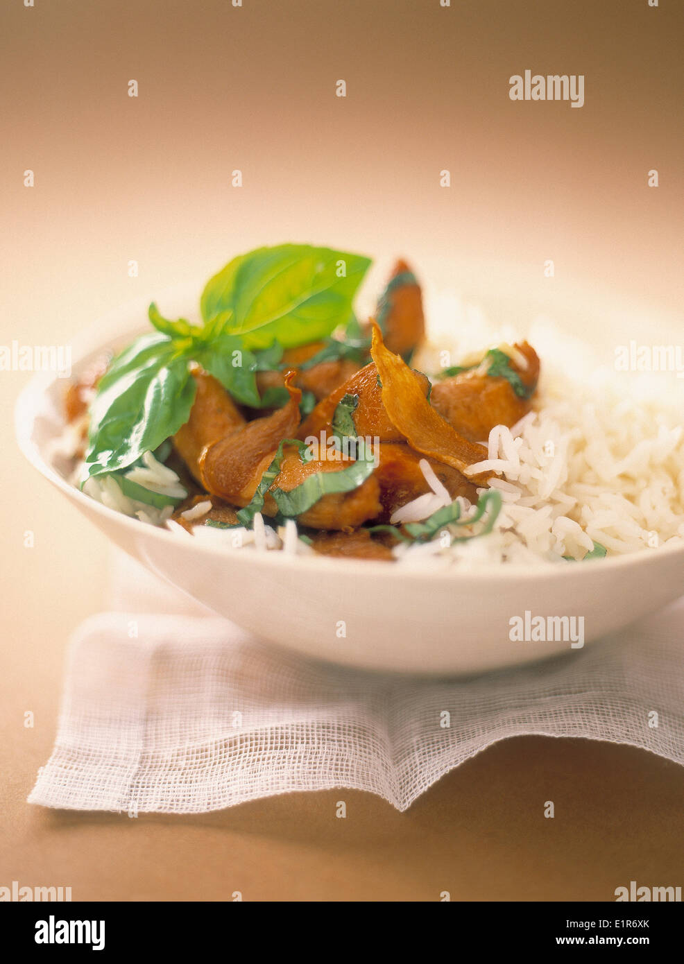 Chicken with basil and basmati rice Stock Photo - Alamy