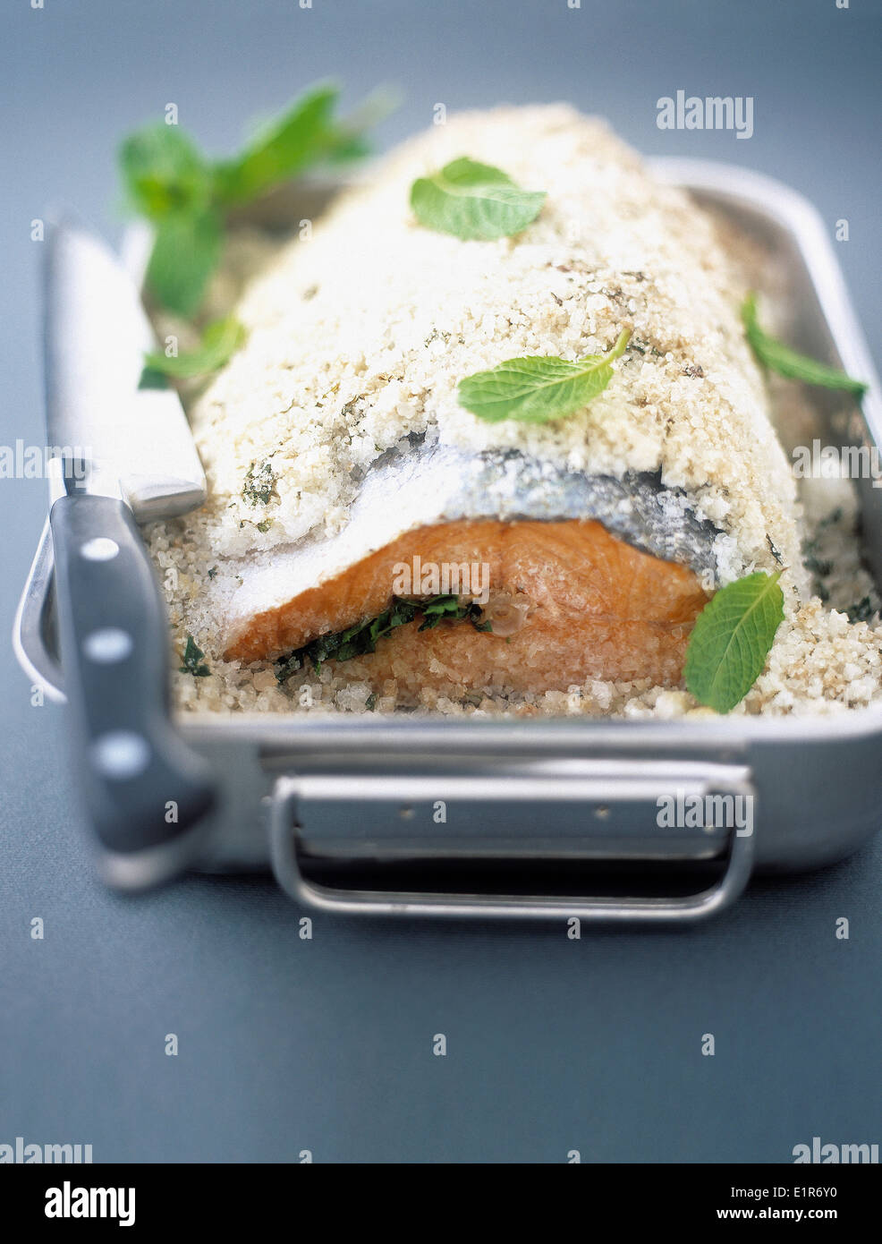 Salmon stuffed with mint in salt crust Stock Photo - Alamy