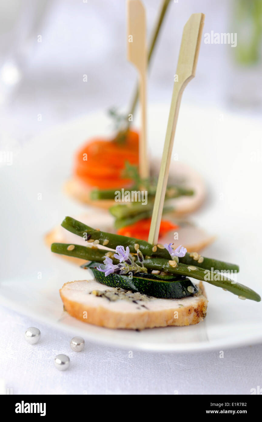 Poultry Dodine and spicy vegetable appetizers Stock Photo - Alamy