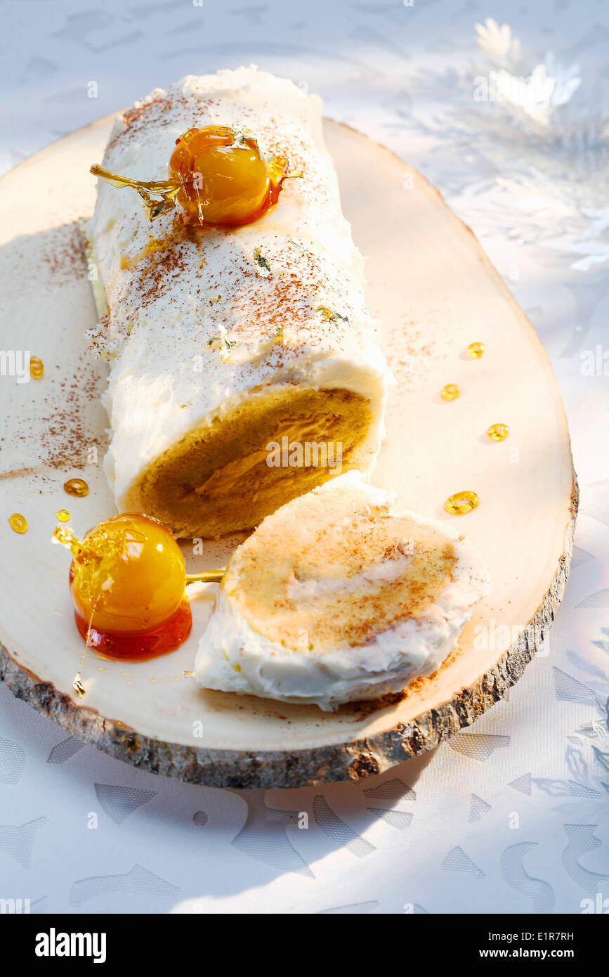 Christmas coconut log cake Stock Photo - Alamy