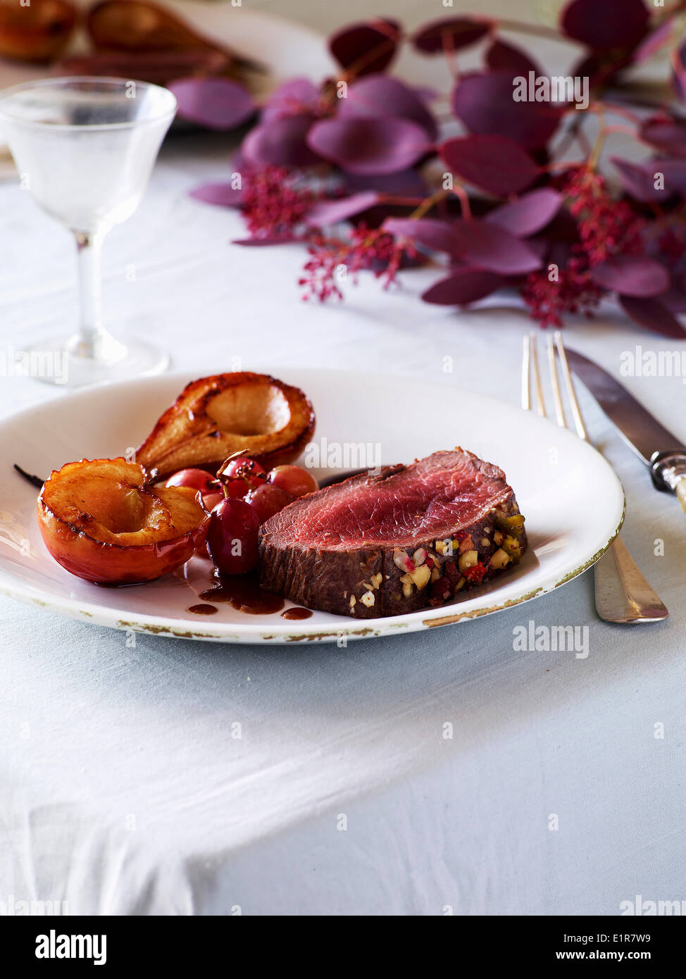 Fillet of doe with roasted fruit Stock Photo - Alamy