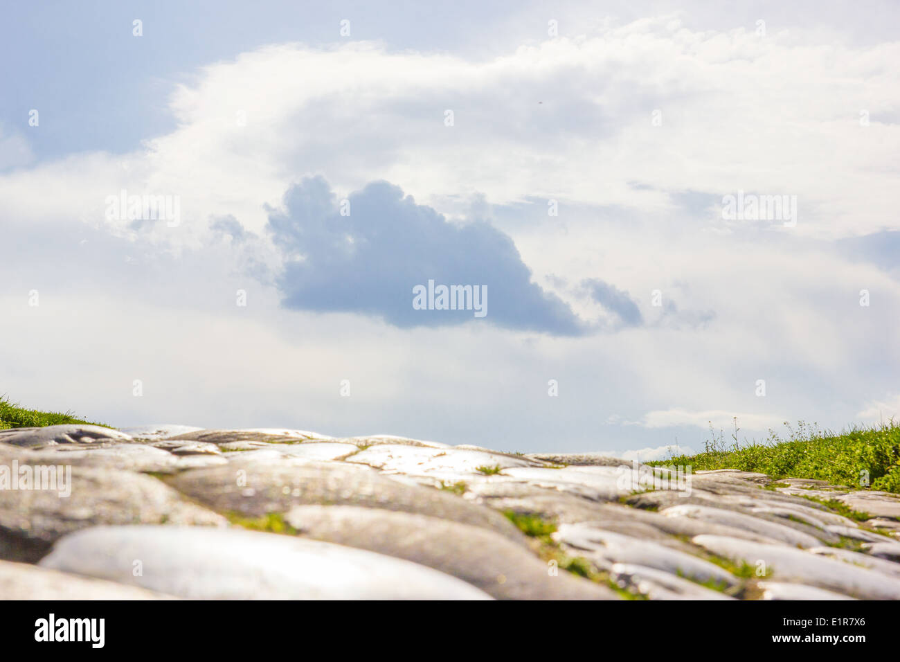 old beautiful turkey paving, cobble road with sky clouds above Stock ...