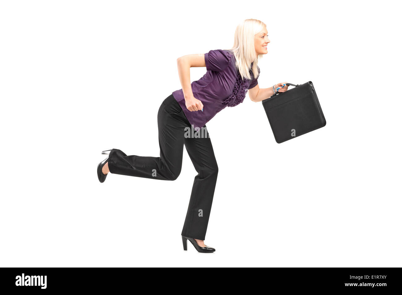 Female running with suitcase hi-res stock photography and images - Alamy