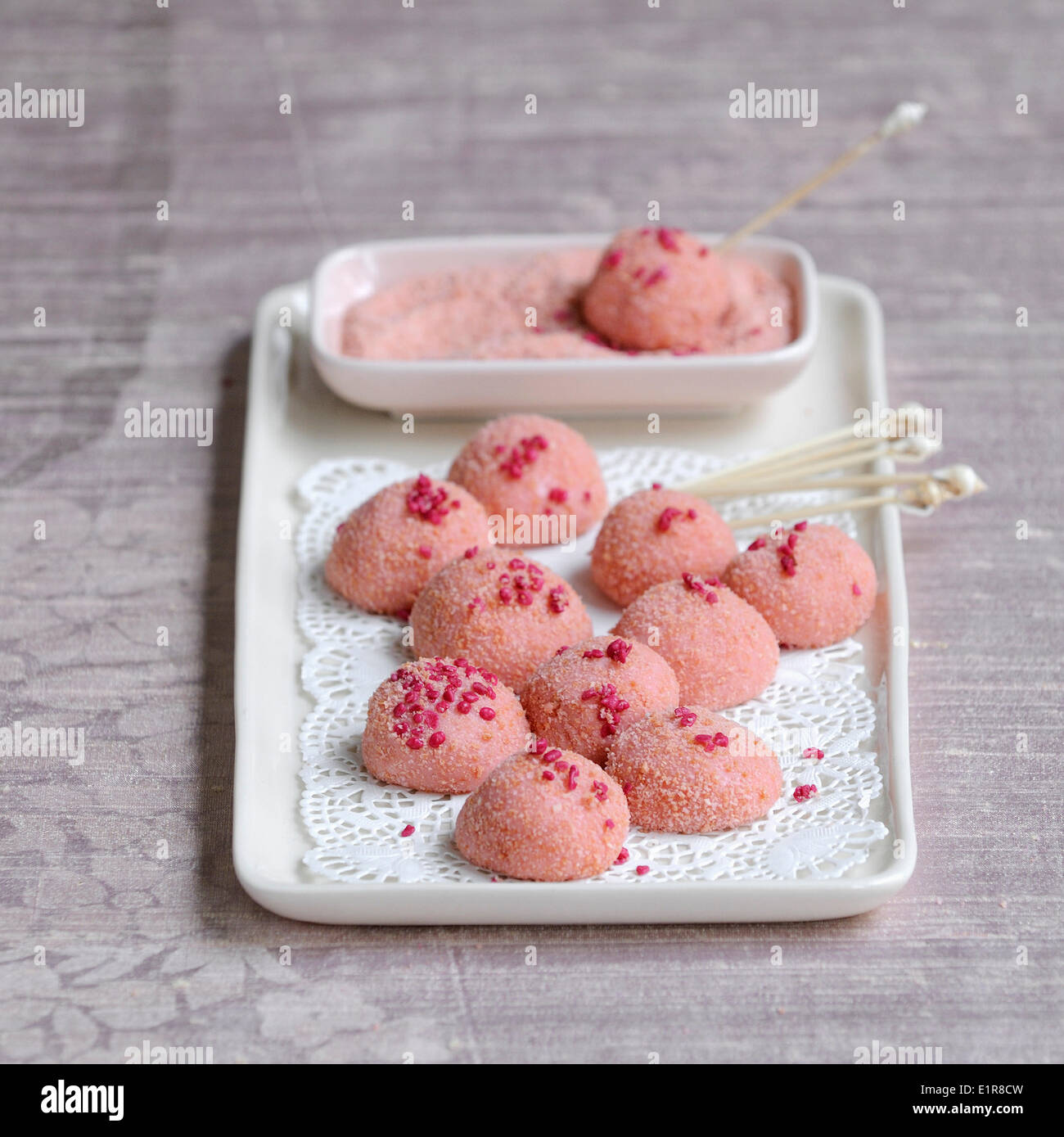 Pink biscuit truffles Stock Photo - Alamy