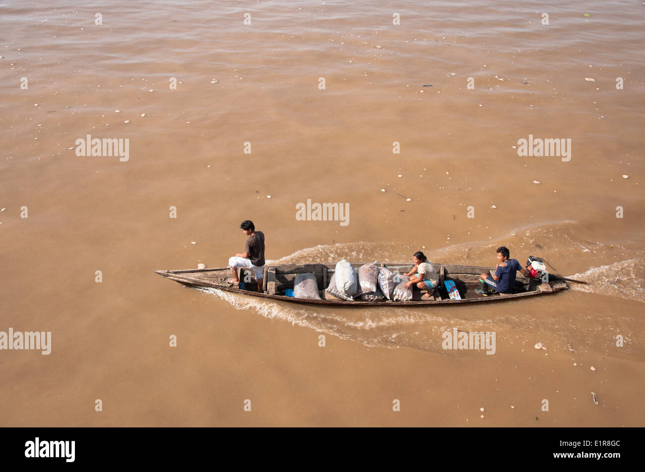 Transport on the Peruvian Amazon is often by canoe with outboard motor ...