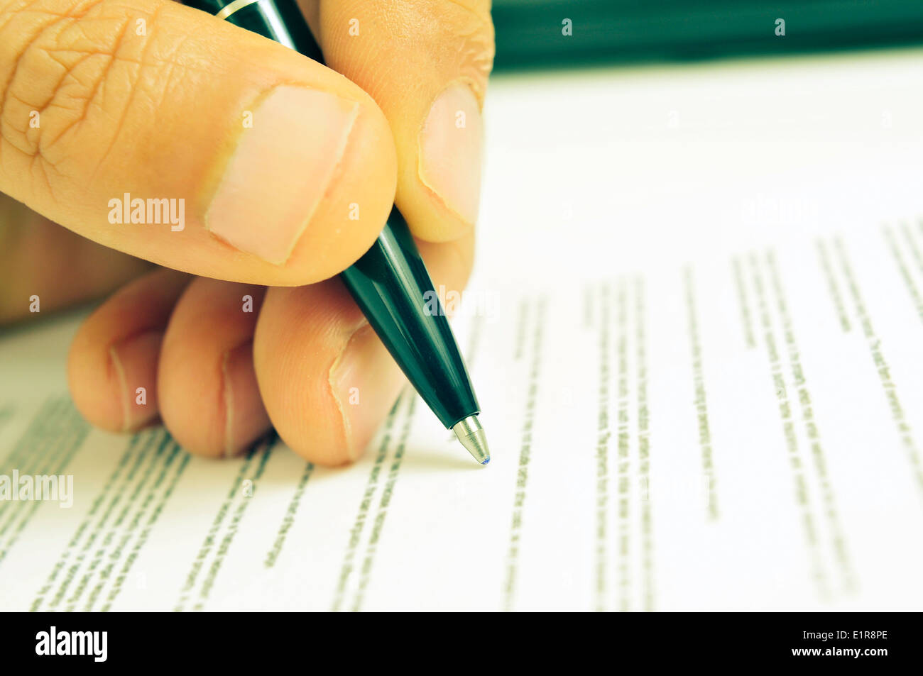 Business man hand signing document hi-res stock photography and images ...