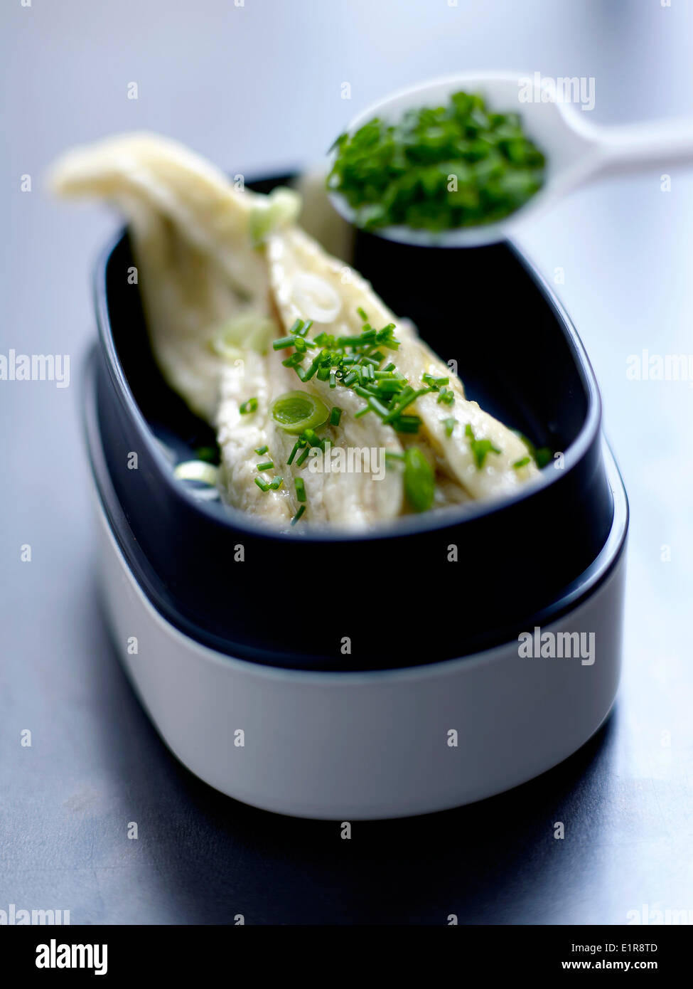 Dab fillets and chive Bento Stock Photo - Alamy