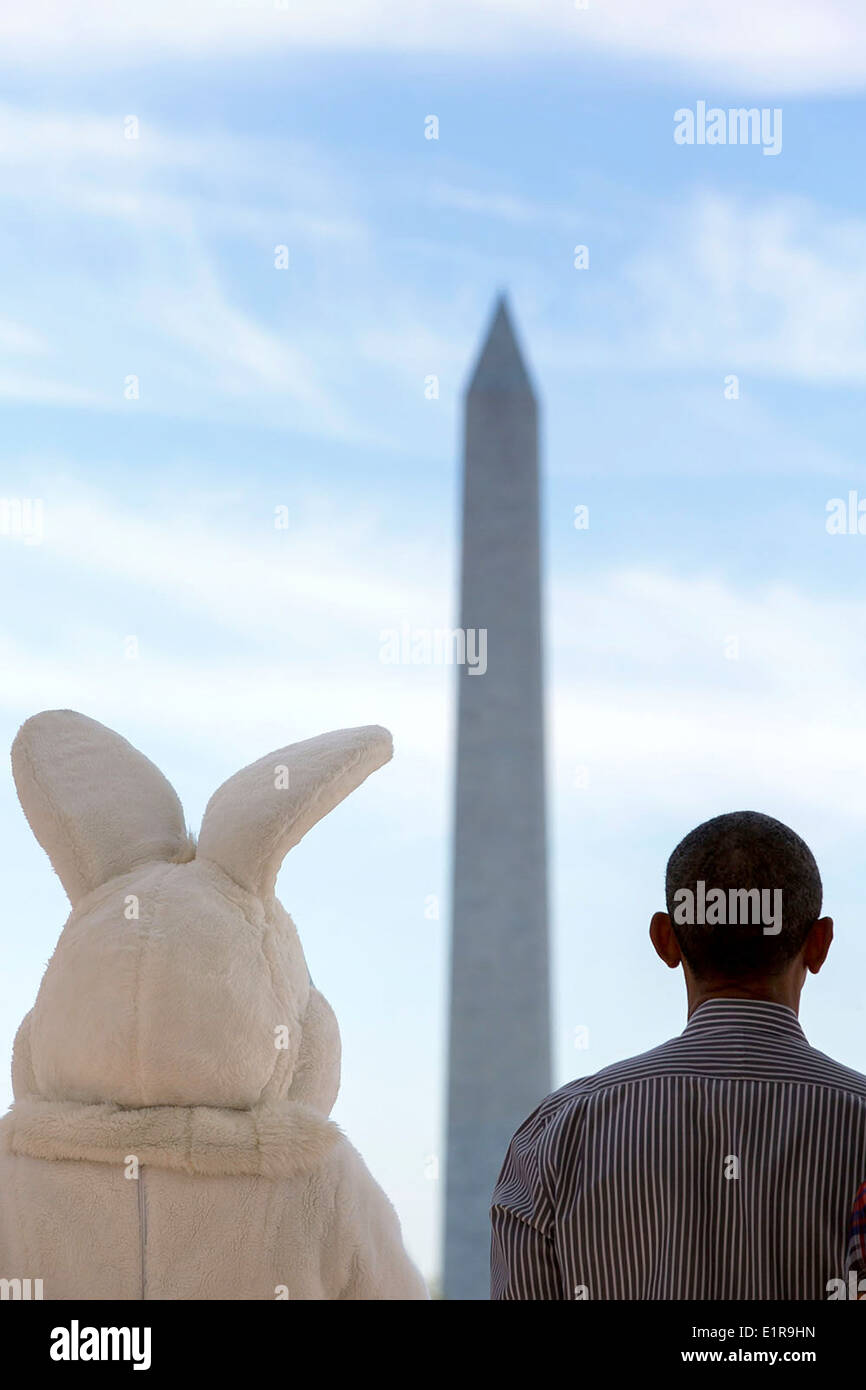 US President Barack Obama and the Easter Bunny stand together during ...
