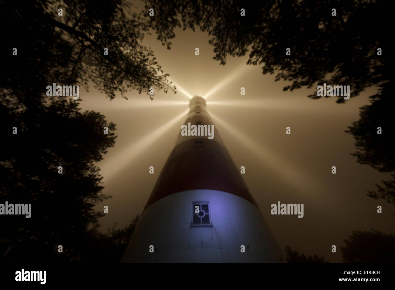 lighthouse in the mist Stock Photo - Alamy