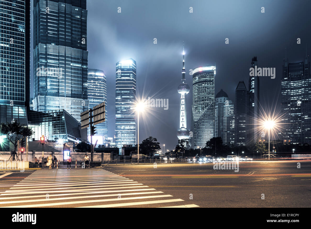 The light trails on the modern building background in shanghai china ...