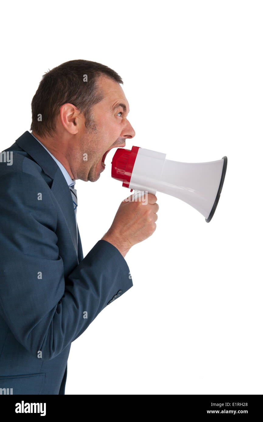 angry business man shouting into a loudhailer or megaphone on white ...