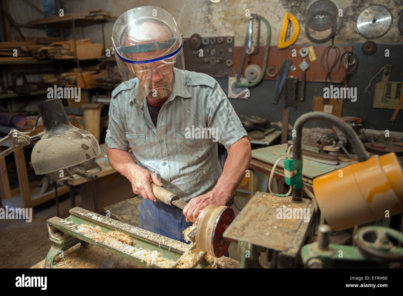 Man working on lathe hi-res stock photography and images - Alamy