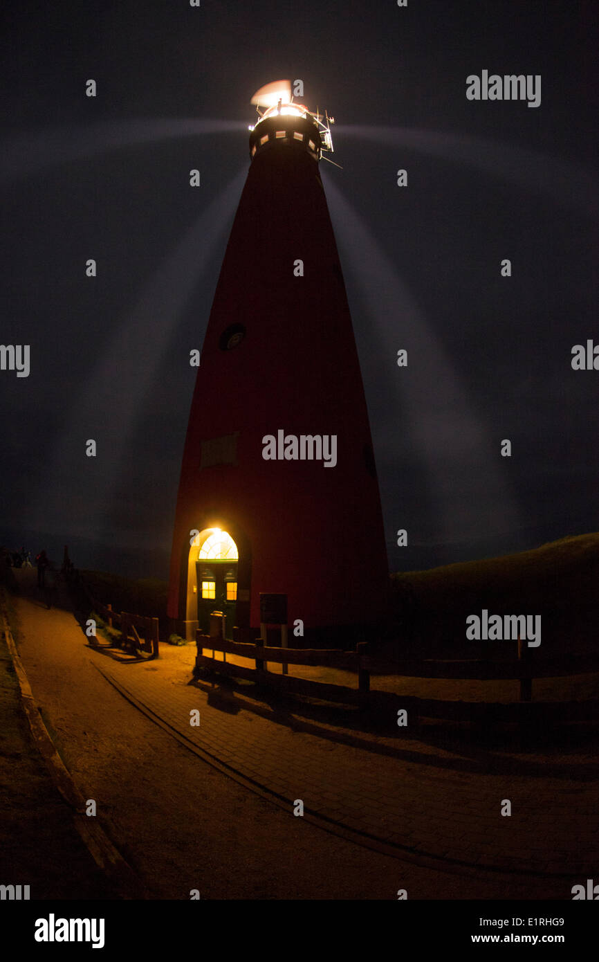 lighthouse in the night Stock Photo - Alamy