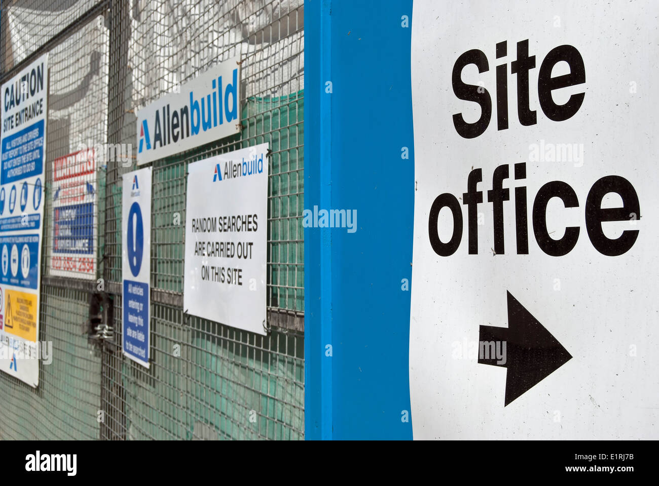 temporary building site sign, with arrow, showing route to site office ...